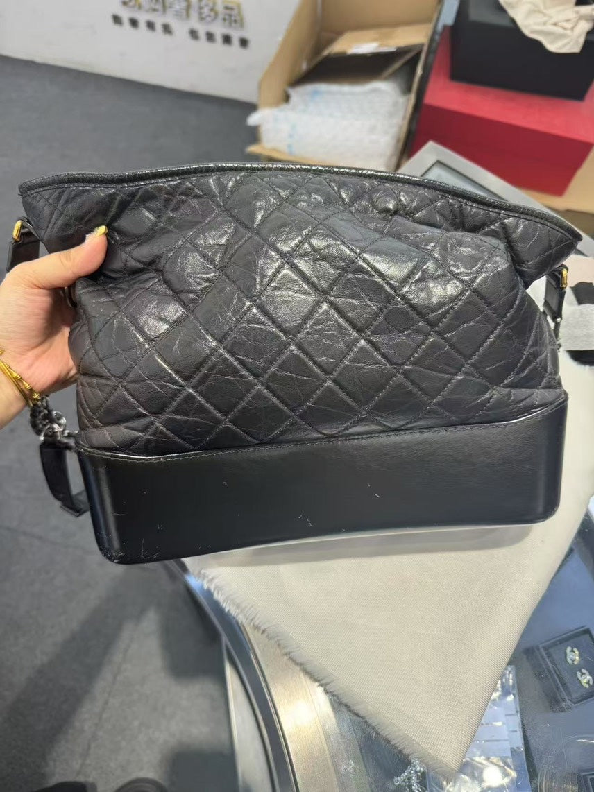 Chanel HBG Quilted Black Leather Hobo Bag | ShopShops